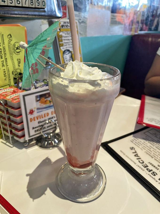Paradise in a glass&mdash;this Hawaiian Tropic milkshake comes with its own tiny umbrella, as if your taste buds needed a vacation too.