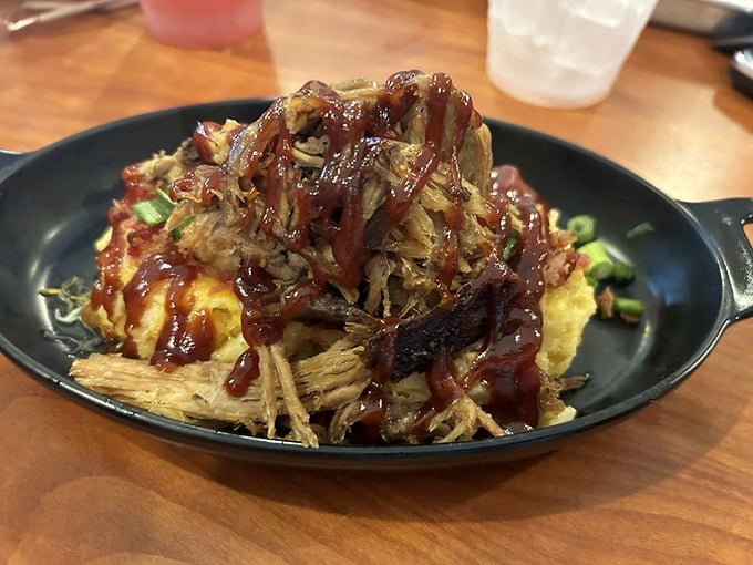 Pulled pork atop creamy mashed potatoes&mdash;proof that sometimes the best ideas are the simplest ones. Comfort food elevated to art form.