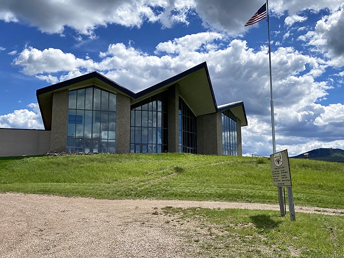 The Western Heritage Center stands like a modern cathedral to history, preserving stories of pioneers while offering views that explain why they stayed.
