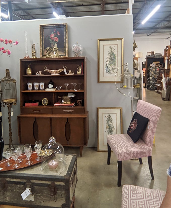 Mid-century furniture arranged with such care, it's like Don Draper's living room exploded into a perfectly curated display.