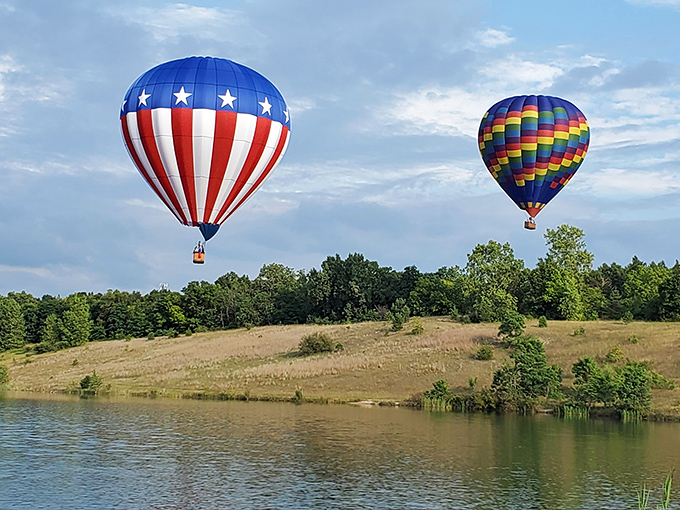 Hot air balloons drifting over Seven Lakes prove that some people take "rise and shine" incredibly seriously and beautifully.