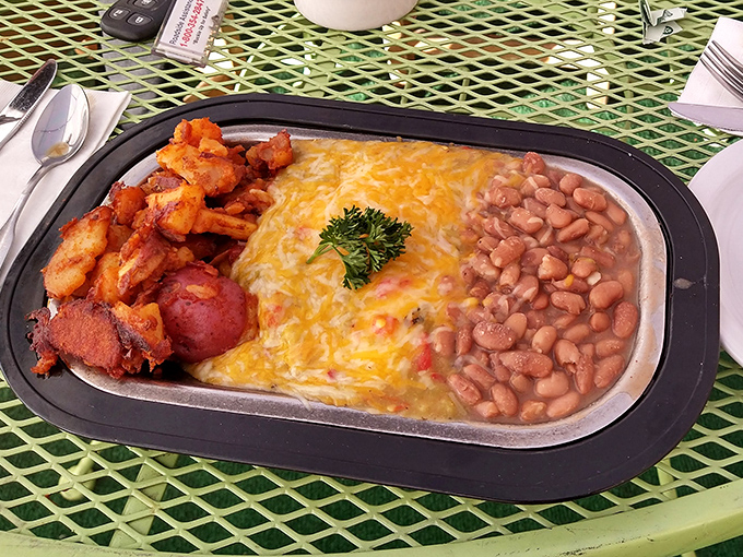 Huevos rancheros served sizzling hot with those perfectly crisp potatoes &ndash; the breakfast equivalent of hitting the culinary lottery. 