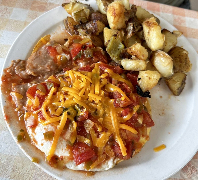 Huevos Rancheros that bridge cultures better than any diplomat could&mdash;eggs, salsa, cheese, and potatoes creating the breakfast equivalent of a group hug.
