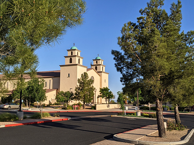Twin bell towers rise against azure skies, reminding visitors that some things transcend denominational differences beautifully.