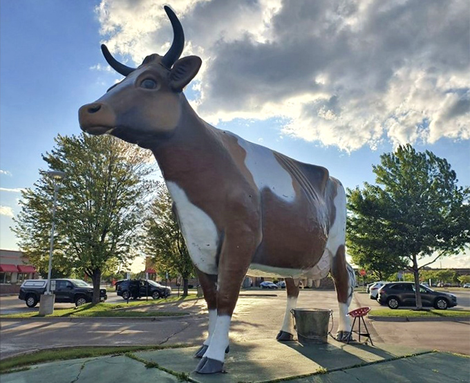 Even on cloudy days, Bessie's steadfast presence reminds us that the best roadside attractions weather all storms with dignified grace.