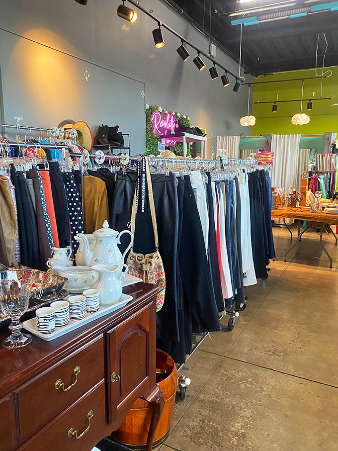 A symphony in organization&mdash;clothing racks create pathways through this treasure trove while vintage dishware waits to grace new tables.