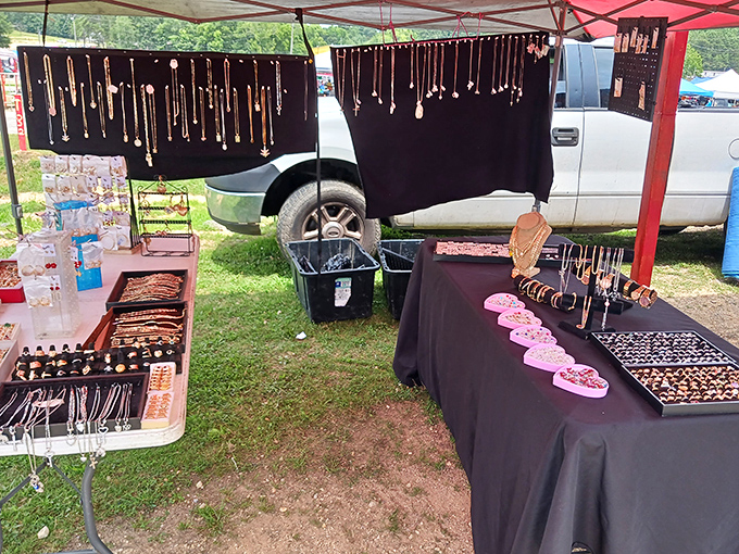 Handcrafted jewelry displays sparkle under tents, each piece waiting to become someone's new favorite conversation starter.