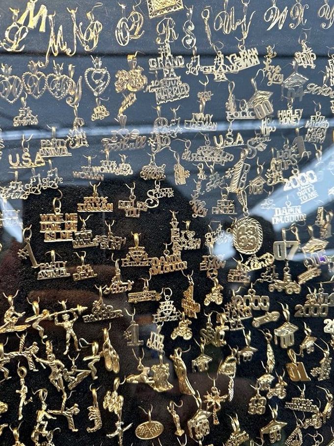 Gold charms that speak louder than words. This dazzling display offers personalized bling for every occasion, relationship status, and life philosophy.