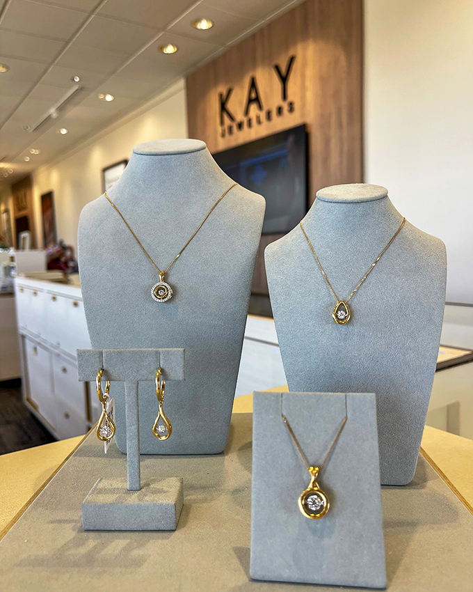 Kay Jewelers' elegant display proves that sparkle doesn't require emptying your savings&mdash;these pendants whisper "special occasion" without shouting "second mortgage."