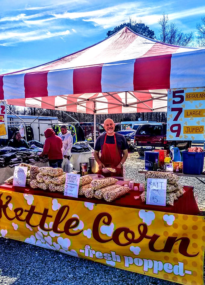 The kettle corn stand—where the sweet aroma functions as an olfactory tractor beam, pulling shoppers from across the market with scientific precision.