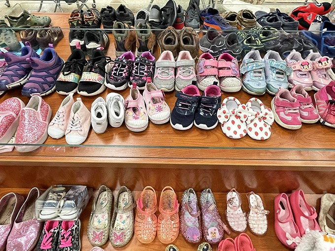 Tiny shoes with enormous personality line the shelves, each pair whispering tales of first steps, playground adventures, and growth spurts that came too soon.