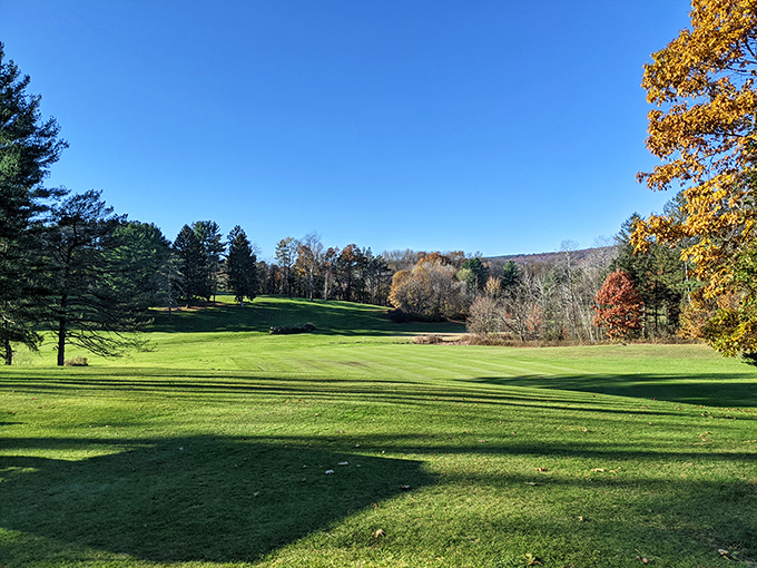 Kingsboro Golf Course unfurls like a green carpet between Adirondack foothills, offering affordable rounds where nature provides the gallery.