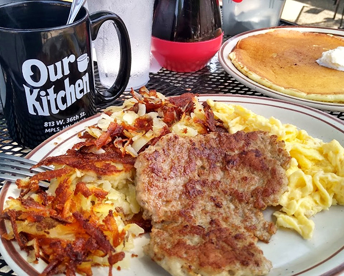The holy trinity of breakfast: perfectly cooked eggs, crispy hash browns, and sausage with the ideal char. This plate doesn't need Instagram filters&mdash;it's naturally photogenic.