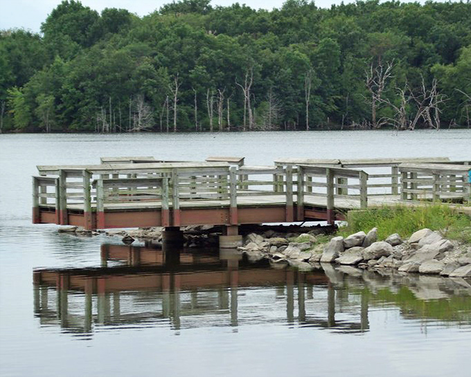 This fishing dock isn't selling anything but peace and quiet. The perfect spot to contemplate life or actually catch dinner.