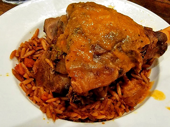 This lamb shank isn't just dinner&mdash;it's a commitment. Fall-off-the-bone tender, swimming in rich sauce atop orzo that's soaking up all that glorious flavor.