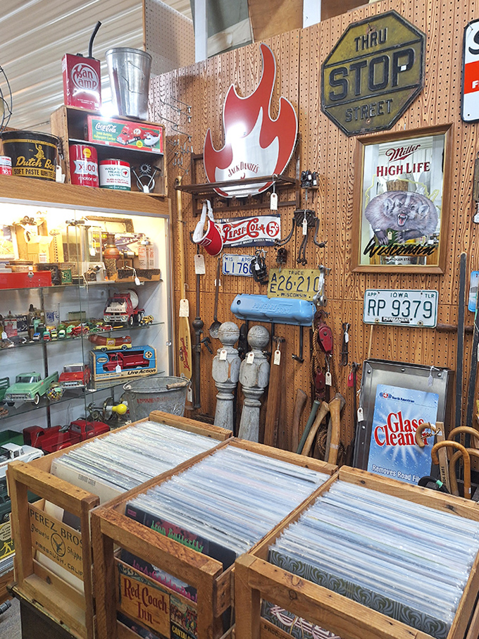 The license plate wall&mdash;where road trips of yesteryear come to retire alongside vintage Pepsi signs and vinyl records.