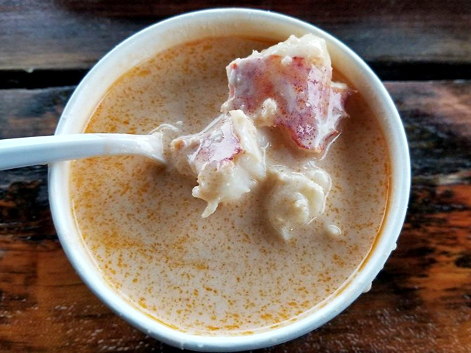 Lobster bisque that's basically a warm hug in soup form, with chunks of lobster playing hide-and-seek in every spoonful.