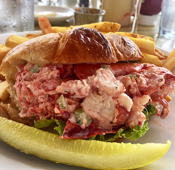 A lobster croissant so generously stuffed, it makes you question every sandwich decision you've made up until this moment. 