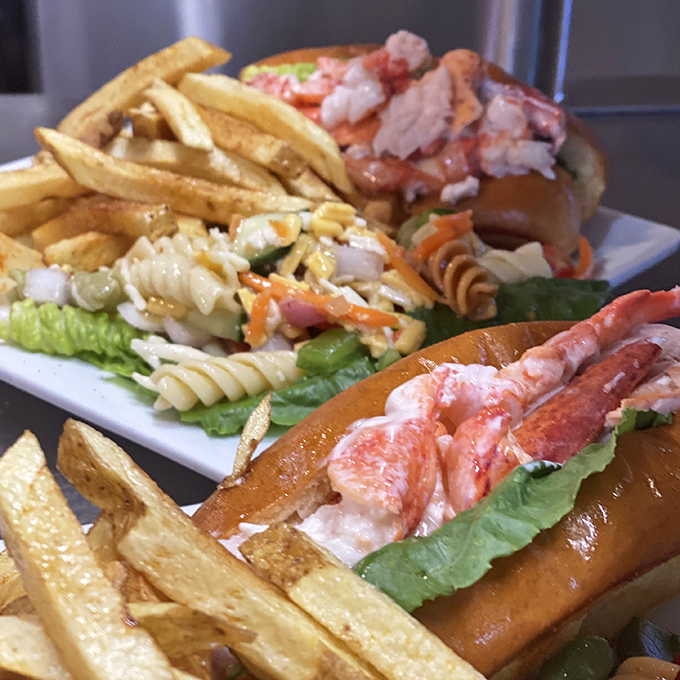 Maine's seafood prowess on full display&mdash;lobster rolls so generously filled, they're practically waving their claws at you.