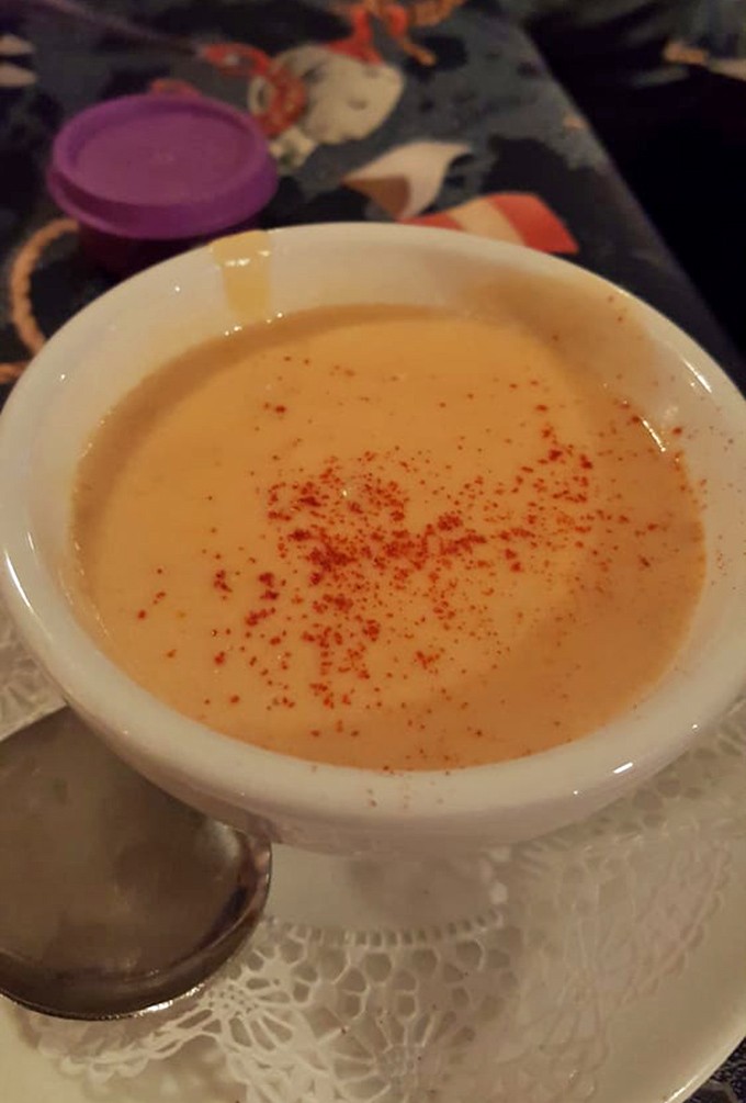 Creamy lobster bisque with just enough paprika on top to make it look as fancy as it tastes.