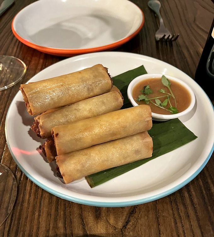 Lumpia that could make spring rolls jealous&mdash;perfectly crisp cylinders filled with savory goodness, just waiting for that dipping sauce rendezvous.