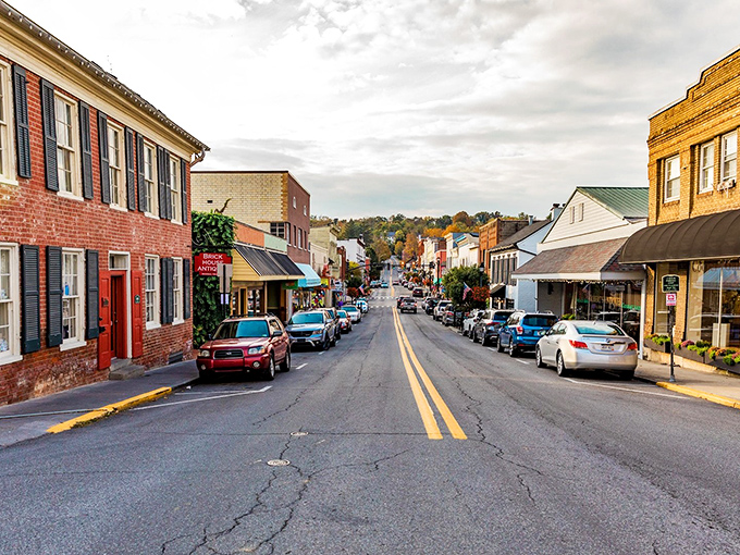 Main Street stretches into the distance like a Norman Rockwell painting come to life, each storefront more inviting than the last.