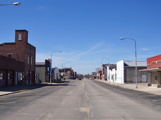 Main Street stretches toward the horizon, a living museum of American small-town architecture bathed in prairie light.