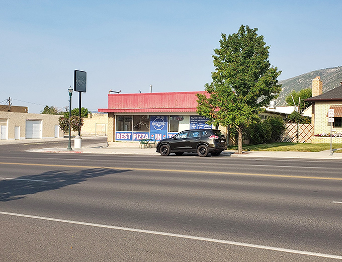 "Best Pizza In Town" the sign boldly claims &ndash; in a place this size, that's either brilliant marketing or deliciously honest advertising.
