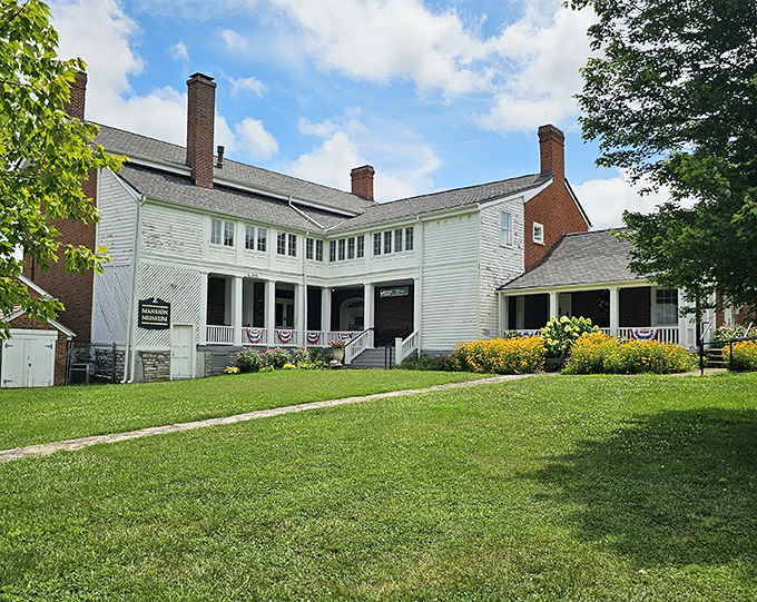 The Mansion Museum stands proudly in its white-columned splendor, a graceful reminder of bygone days when architecture had both personality and posture.