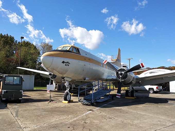 The elegant Martin 4-0-4 airliner stands ready for boarding, a reminder of when flying was an occasion worthy of your Sunday best.