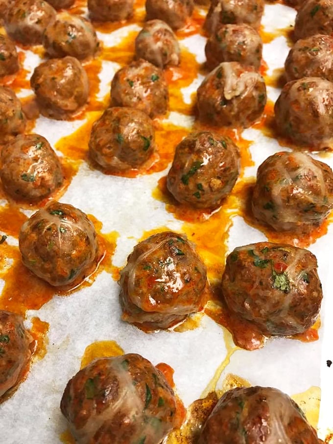 These aren't just meatballs; they're little spheres of herby, savory perfection waiting to join your pizza party.