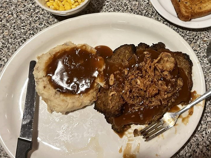 Meatloaf and mashed potatoes that would make your grandmother both proud and jealous. That gravy pool isn't just sauce&mdash;it's liquid comfort in a desert oasis.