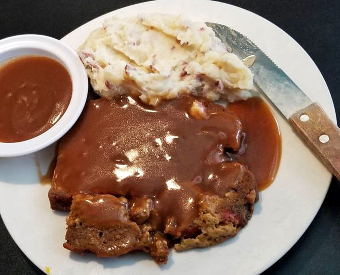 Meatloaf that doesn't just remind you of home—it makes you question why you ever left. That gravy could solve world conflicts.