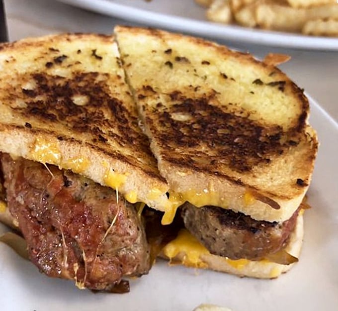 The patty melt: where burger meets grilled cheese in a beautiful marriage that would make any comfort food enthusiast weep with joy.