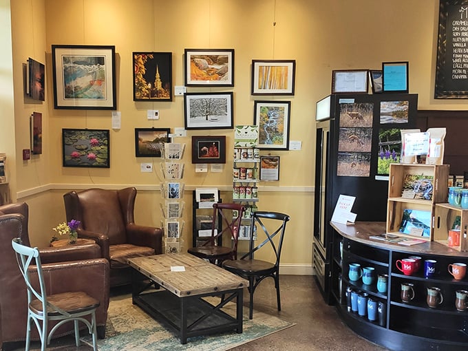 A cozy corner where shopping survivors can regroup with local photography, comfortable leather chairs, and the caffeine needed for round two.