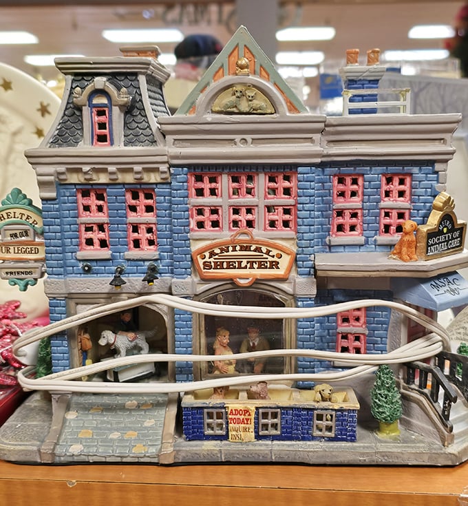 This miniature "Animal Shelter" figurine ironically found shelter itself among the collectibles at Helping Hands.
