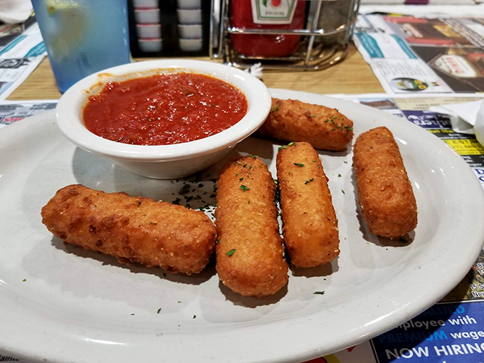 Golden-brown mozzarella sticks with marinara &ndash; because sometimes the perfect meal is just fried cheese with a side of nostalgia.