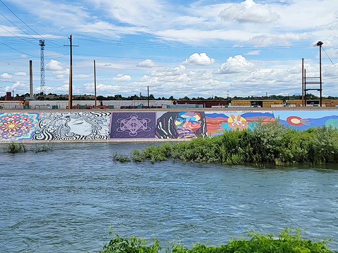 These vibrant riverside murals prove that sometimes the best art gallery has no roof and charges no admission.