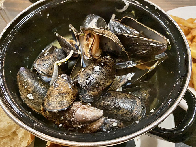 A pot of mussels that transports you straight to Brussels' Grand Place, with each shell hiding a treasure of briny perfection.