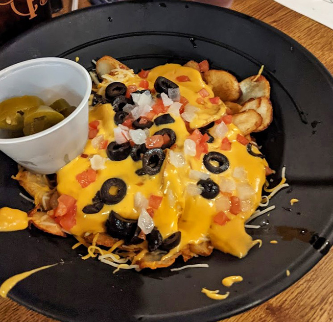 These nachos aren't messing around&mdash;loaded with melty cheese, black olives, and jalape&ntilde;os, they're the perfect shareable starter unless you're feeling particularly selfish.