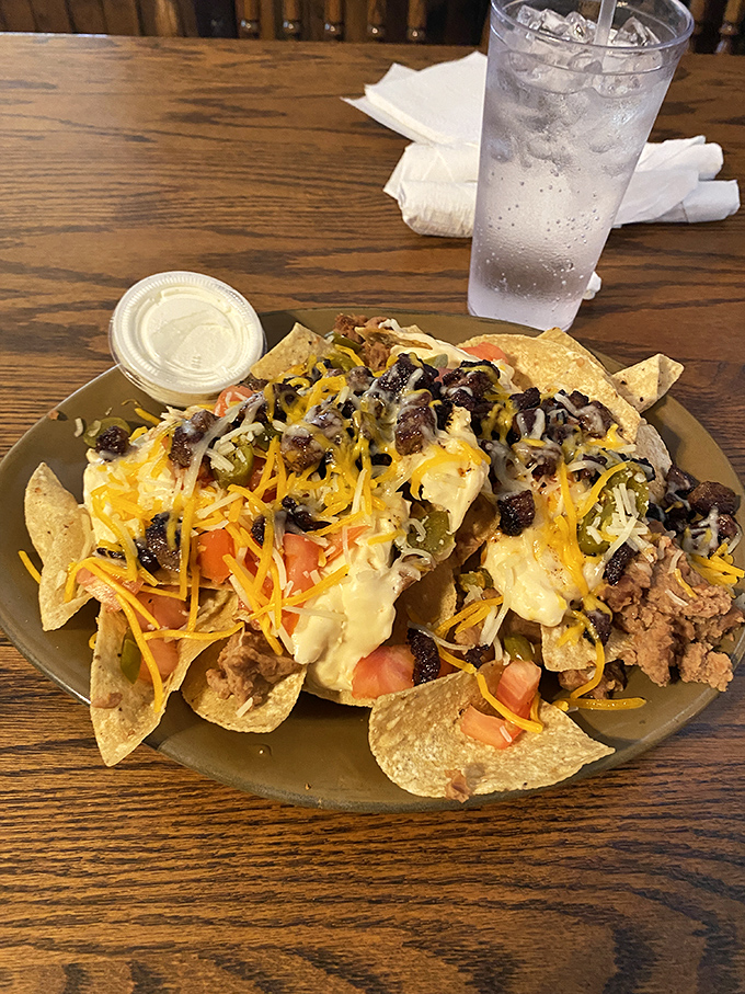 These loaded nachos aren't messing around &ndash; they're the "go big or go home" philosophy transformed into a shareable mountain of deliciousness.