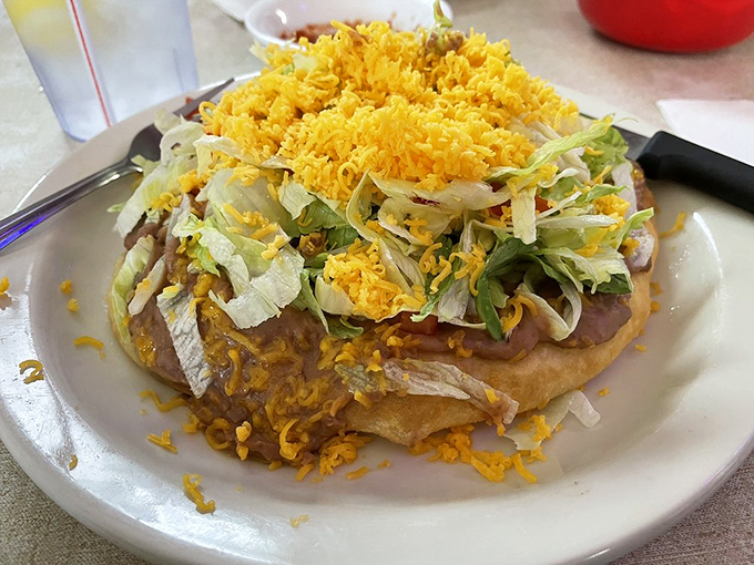 The legendary Navajo taco – where fry bread meets beans, meat, and cheese in a cultural handshake that results in a dish bigger than your face.