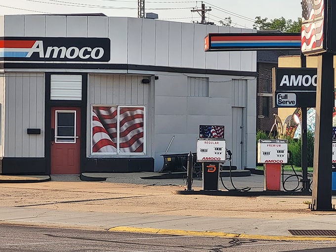 Madison's Amoco station stands nearby, fueling both vehicles and visitors' appetites for more quirky roadside attractions.