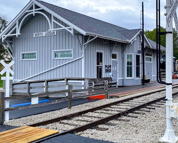 The beautifully restored North Judson Depot stands as a time capsule of small-town Americana, its classic railroad architecture welcoming visitors just as it did passengers decades ago.