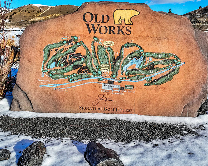 The Old Works Golf Course sign showcases Jack Nicklaus's ingenious design, where fairways and Montana's mining heritage share the landscape.