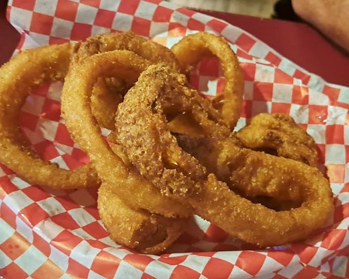 Onion rings that shatter with each bite, the perfect crispy counterpoint to all that tender, smoky meat. Resistance is futile.
