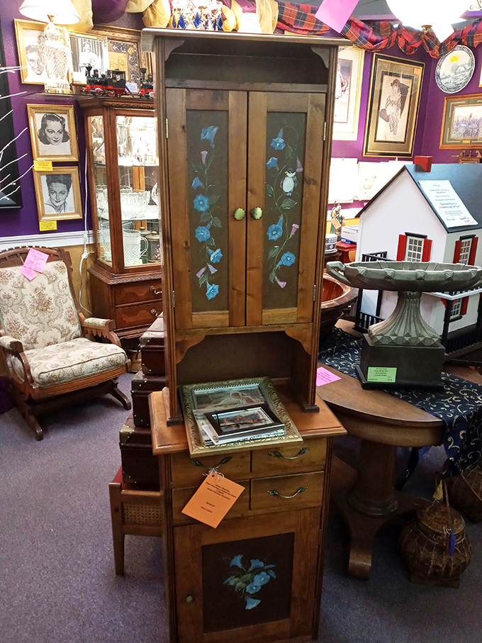 This hand-painted cabinet with delicate blue flowers isn't just furniture&mdash;it's someone's careful craftsmanship preserved for a new generation to appreciate.