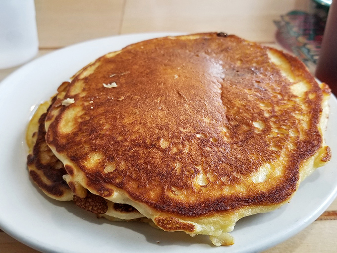 Pancakes so golden and fluffy they deserve their own Instagram account. Breakfast at Big Sam's proves they're not just seafood savants&mdash;they're morning maestros too.