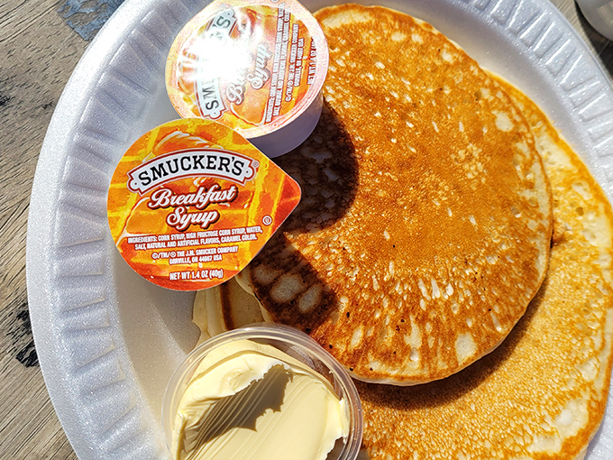Golden-brown pancakes that could make your grandmother jealous. Add Smucker's syrup and suddenly the desert feels like home.
