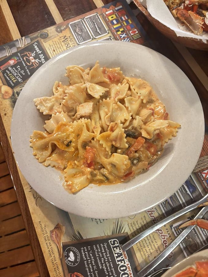 Seafood pasta that bridges Italian tradition with Carolina coastal influence. Comfort food gets an oceanic upgrade that would make Neptune himself nod approvingly.